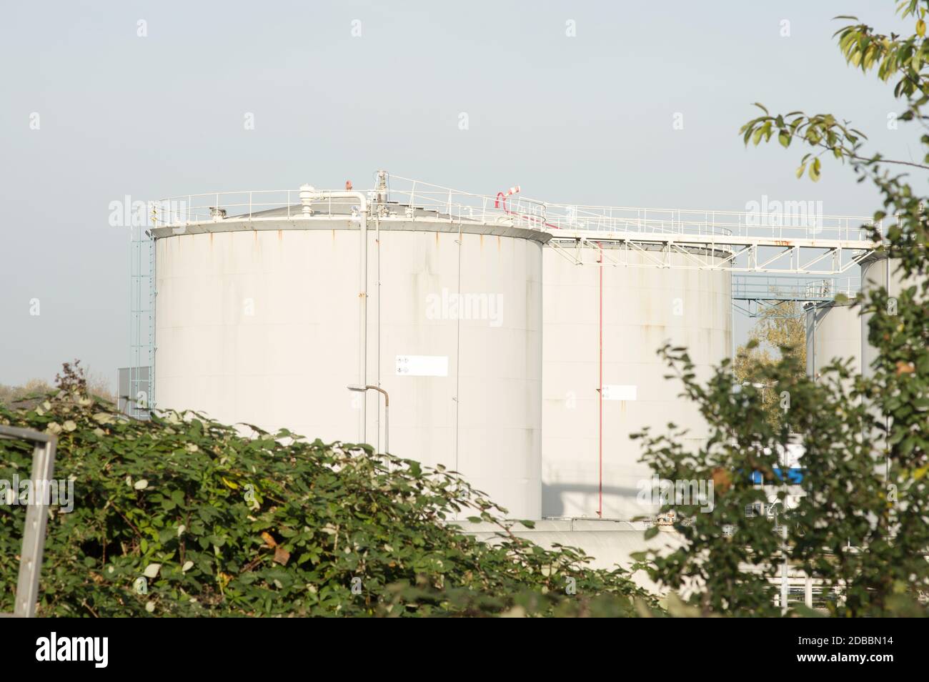 Large grey industrial tanks for petrol and oil storage in Arnhem ...