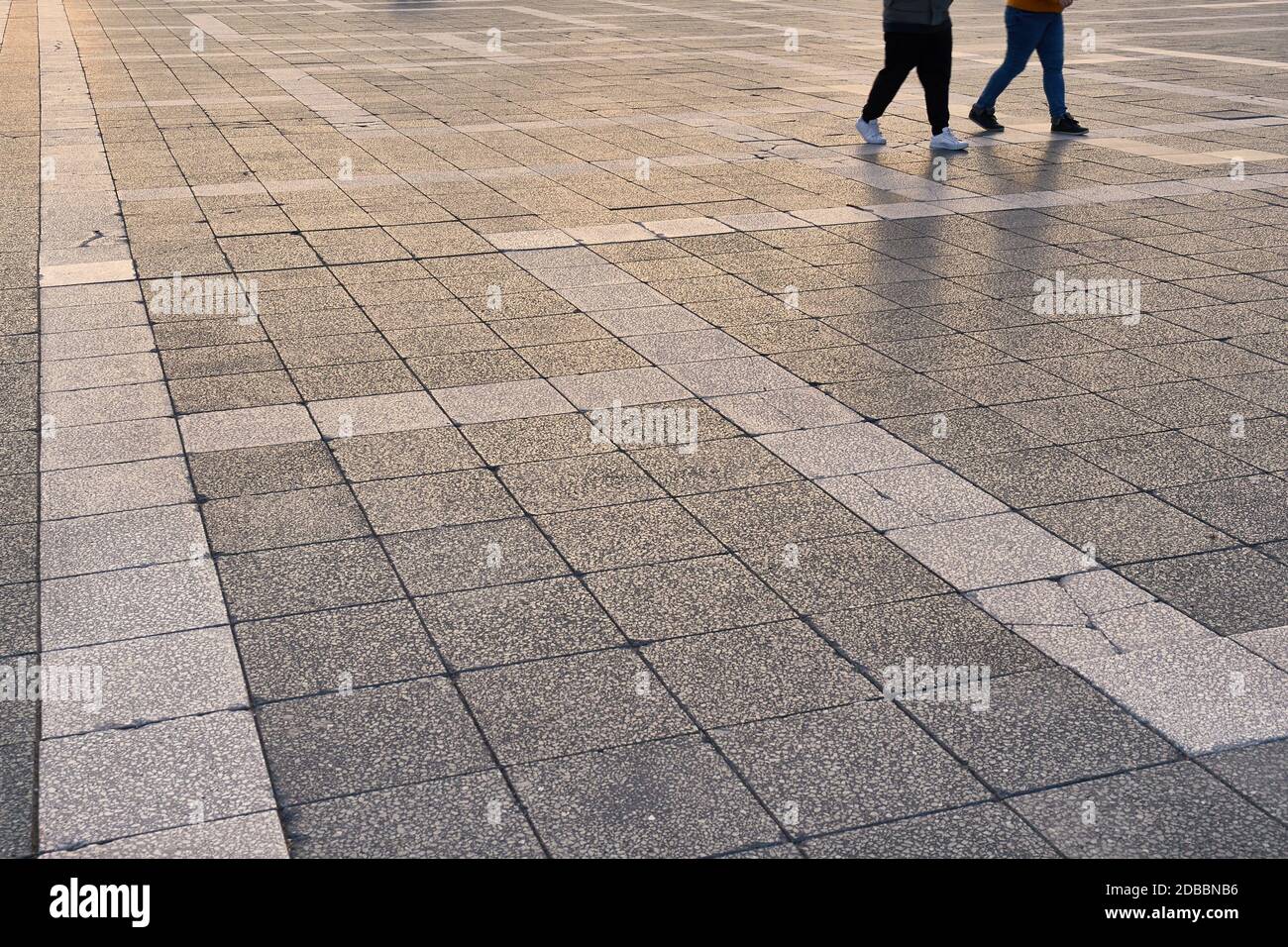Pavement made smooth stone tiles on a square Stock Photo - Alamy
