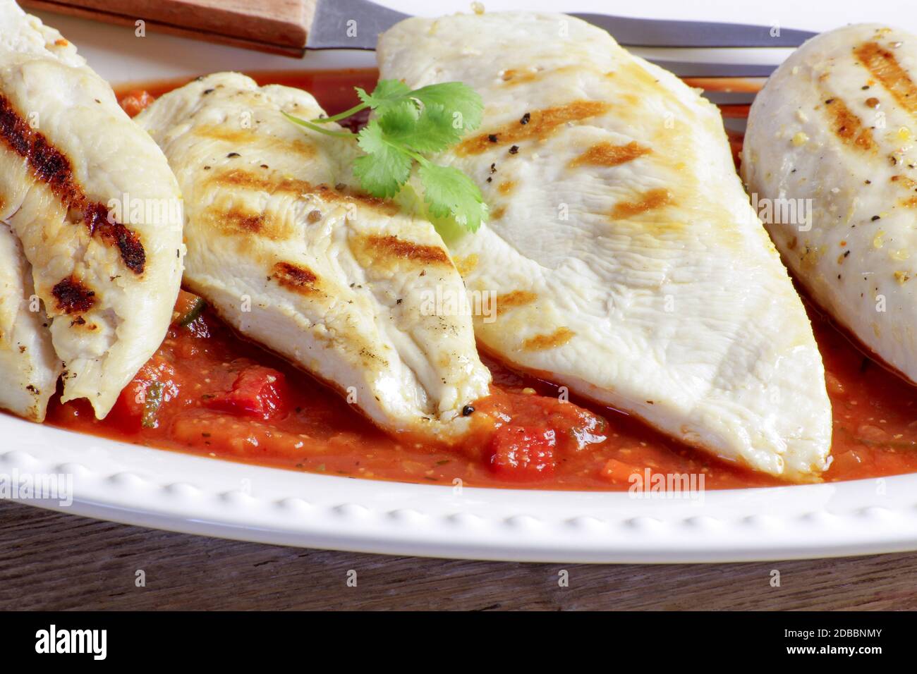 cooked chicken fillet Stock Photo - Alamy