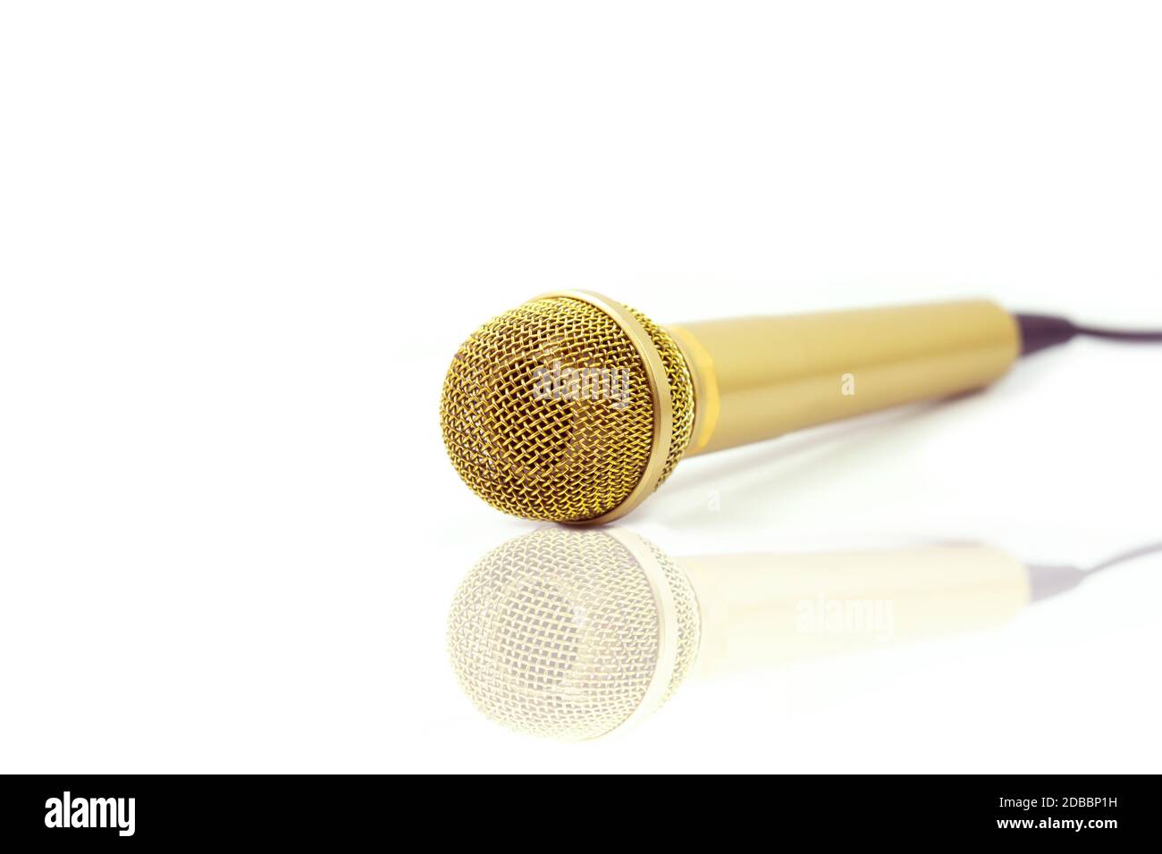 Microphone Gold on isolated white. Entertainment and sound concept ...