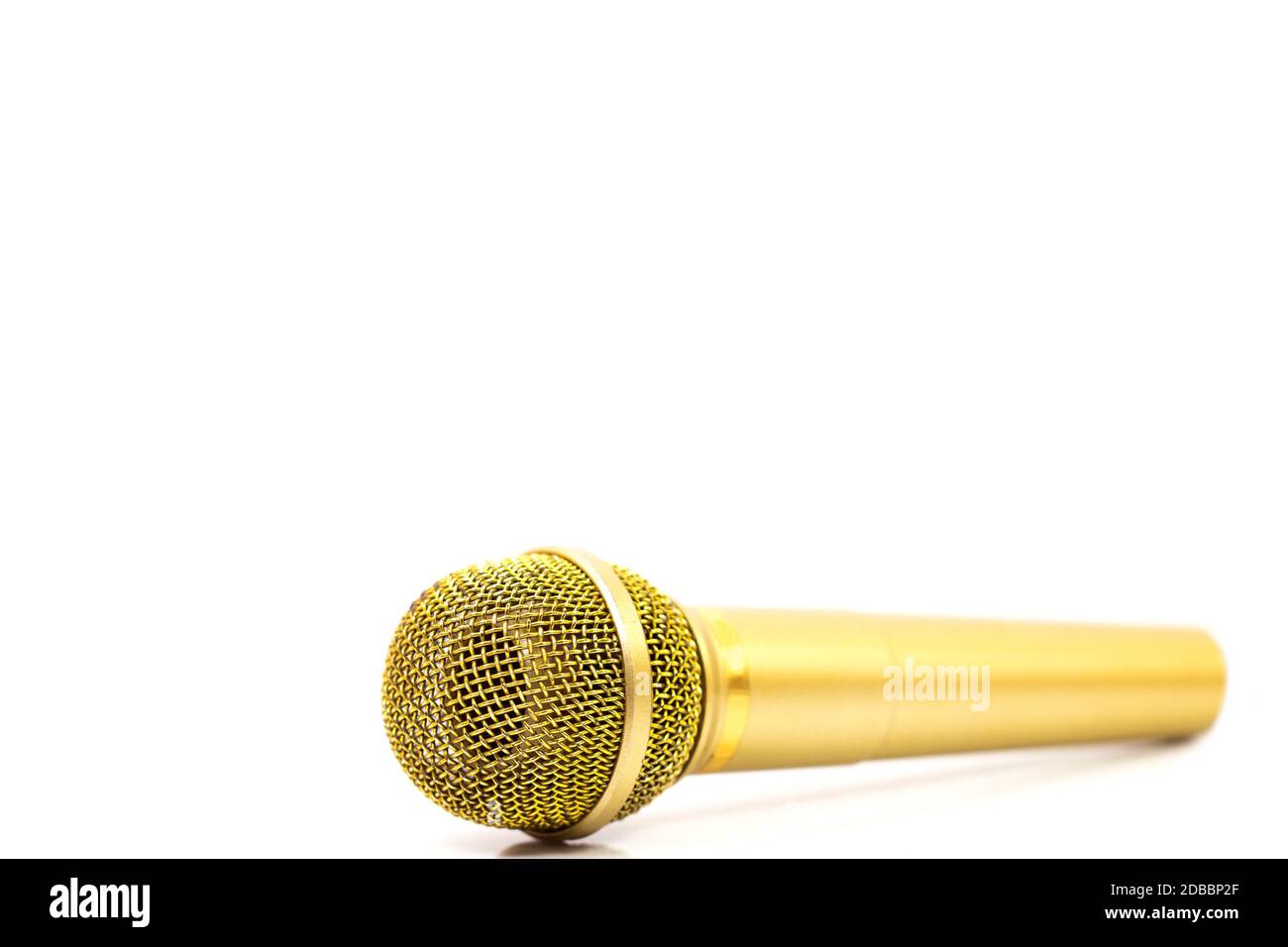 Microphone Gold on isolated white. Entertainment and sound concept ...