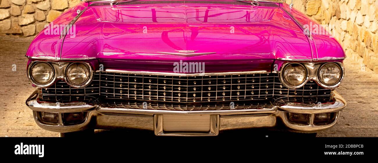 Vintage classic retro car. Beautiful pink auto, front view Stock Photo ...