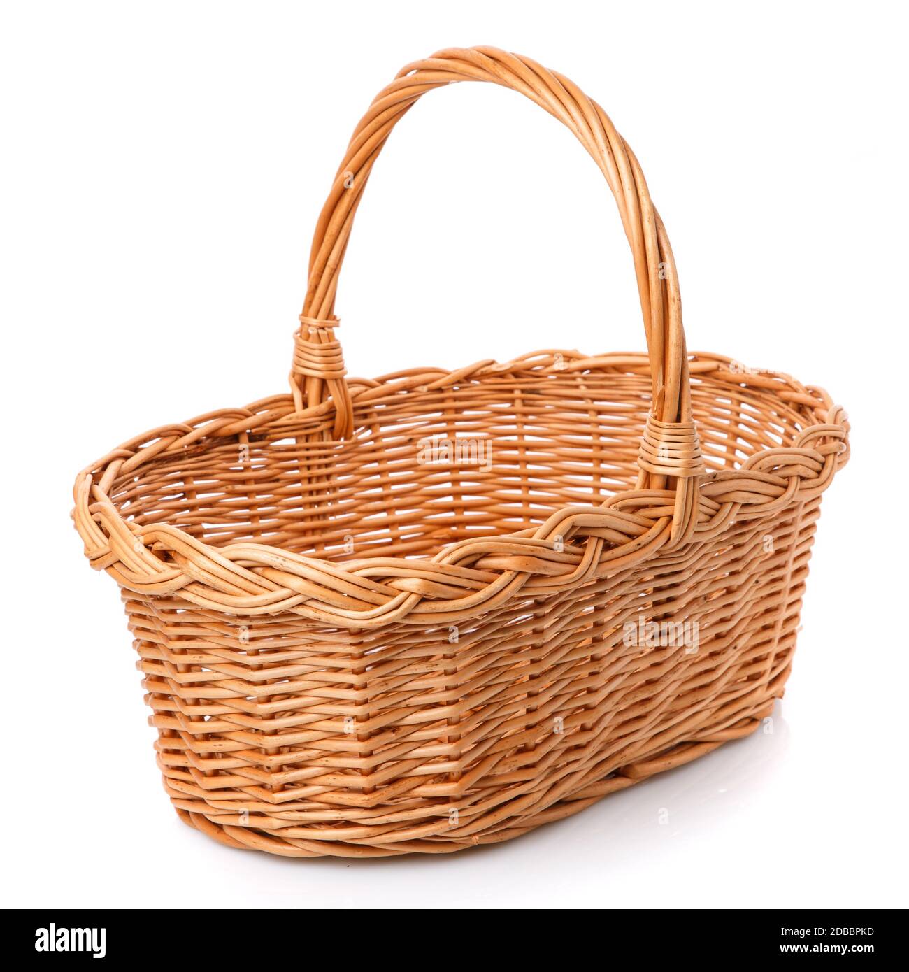 Big square brown wicker basket made of vines on a white background ...