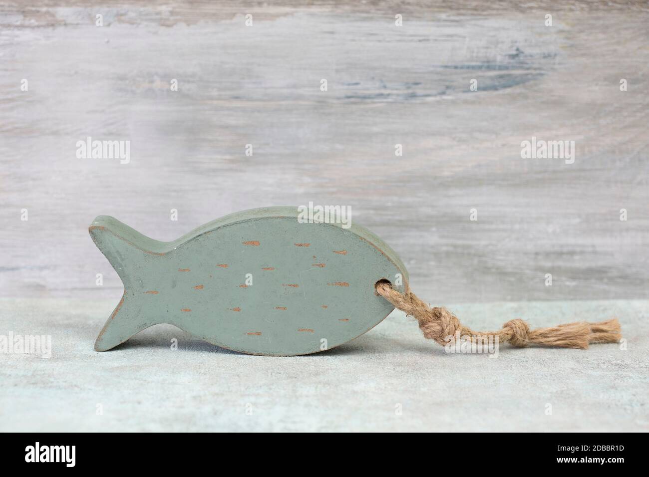 Fish on wooden textured background with copy space, perfect for a ...