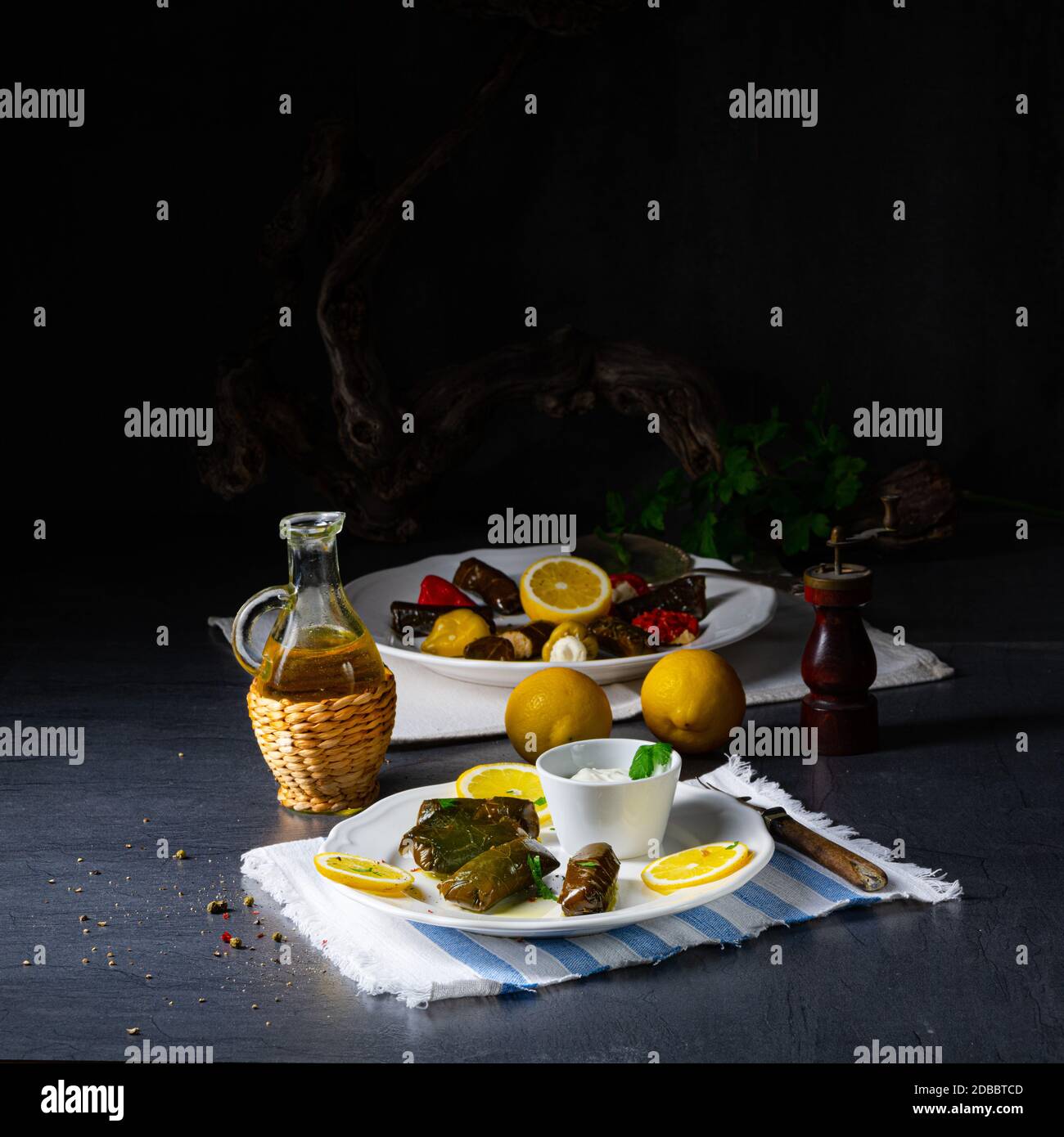 Dolmades - stuffed grape leaves the Greek way Stock Photo - Alamy