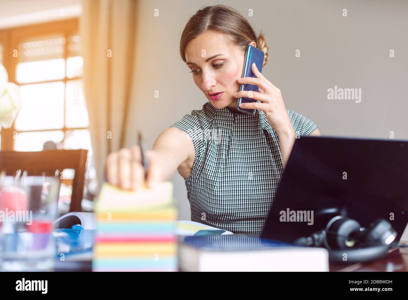 Stressed young woman working from hi-res stock photography and images ...