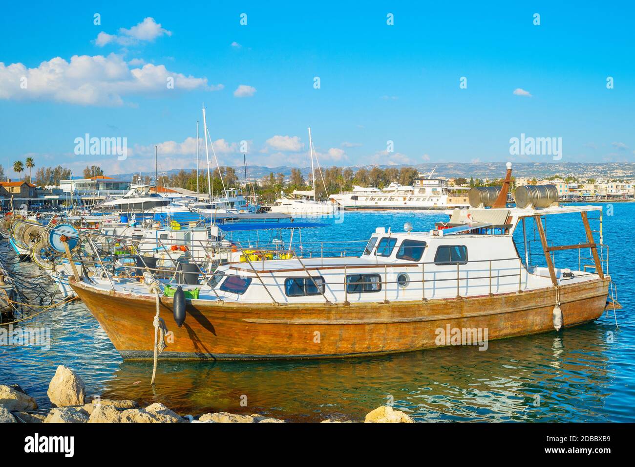 Marina with yachts and motorboats in bright sunlight. Paphos, Cyprus ...