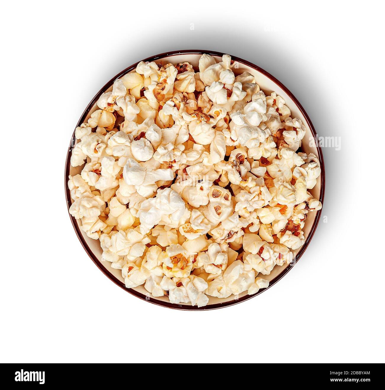 Popcorn in bowl top view isolated on white background Stock Photo - Alamy