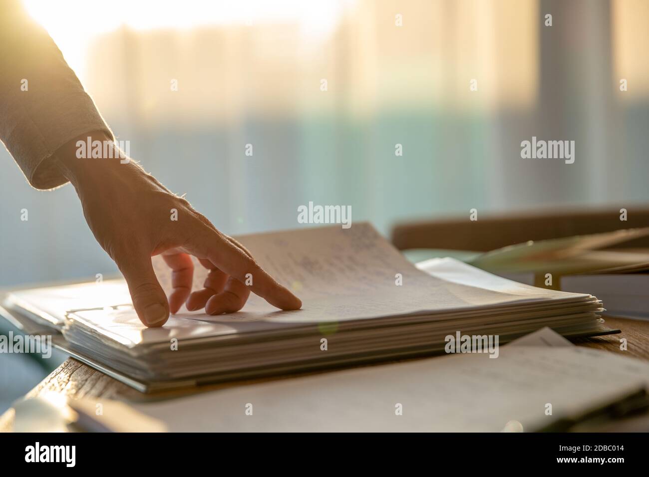 checking accounting documents in the office Stock Photo - Alamy