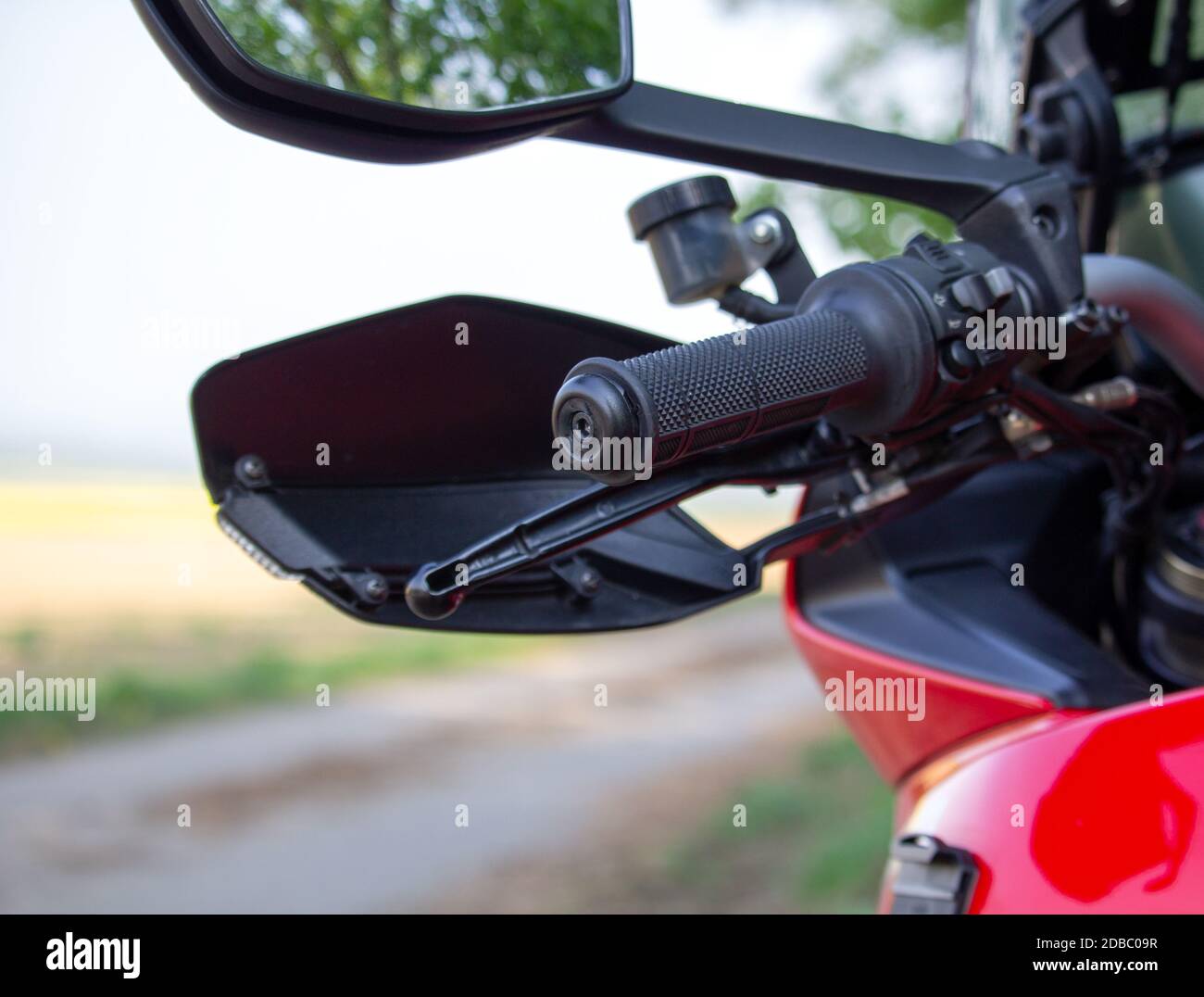 Fastening screw for the handlebar end piece on a motorcycle Stock Photo ...