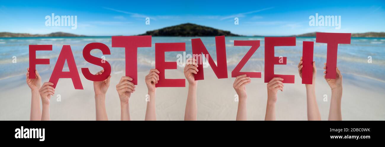 People Hands Holding Red German Word Fastenzeit Means Fasting. Ocean ...