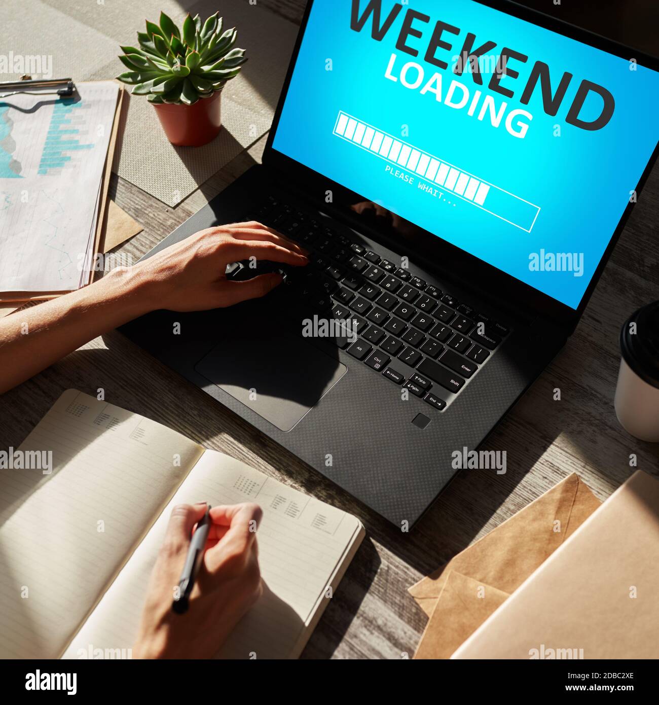 Weekend loading status bar message on device screen Stock Photo - Alamy