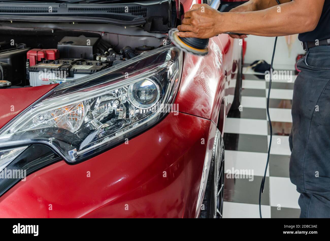 Auto polishing with machine.car polish to remove and recover the car ...