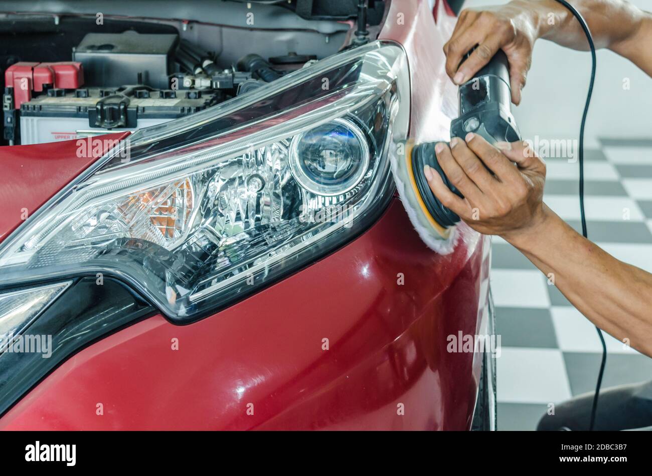 Auto polishing with machine.car polish to remove and recover the car ...