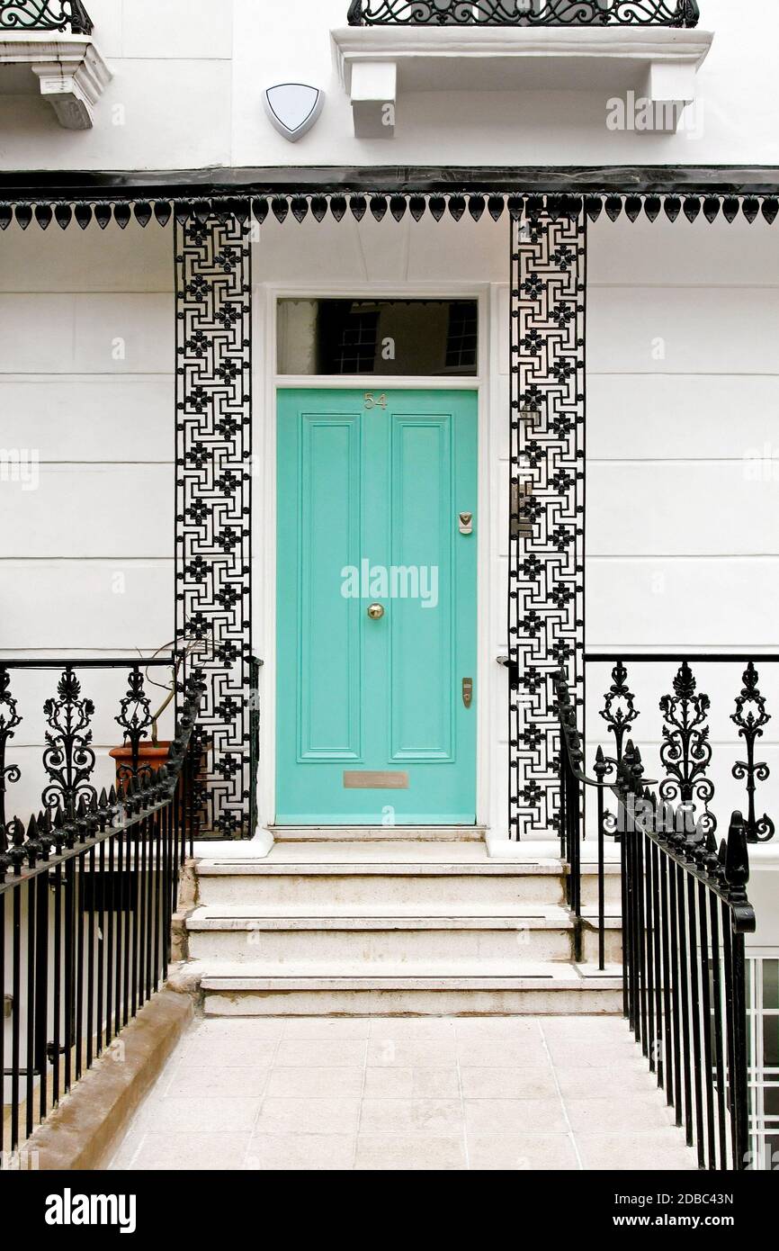 Blue entrance door on Victorian style house Stock Photo - Alamy