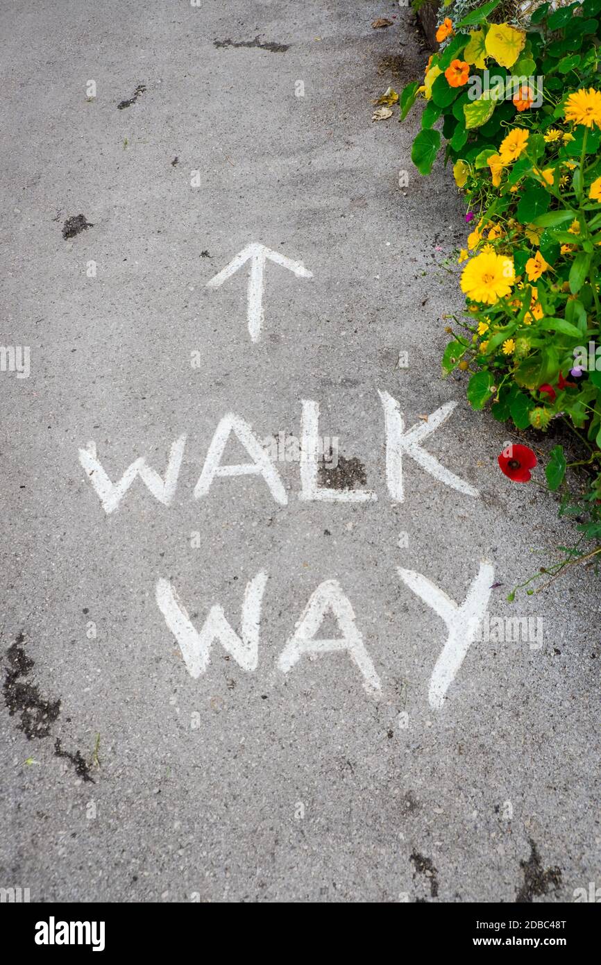 pedestrian road markings on footpath in the village of Dent UK Stock ...