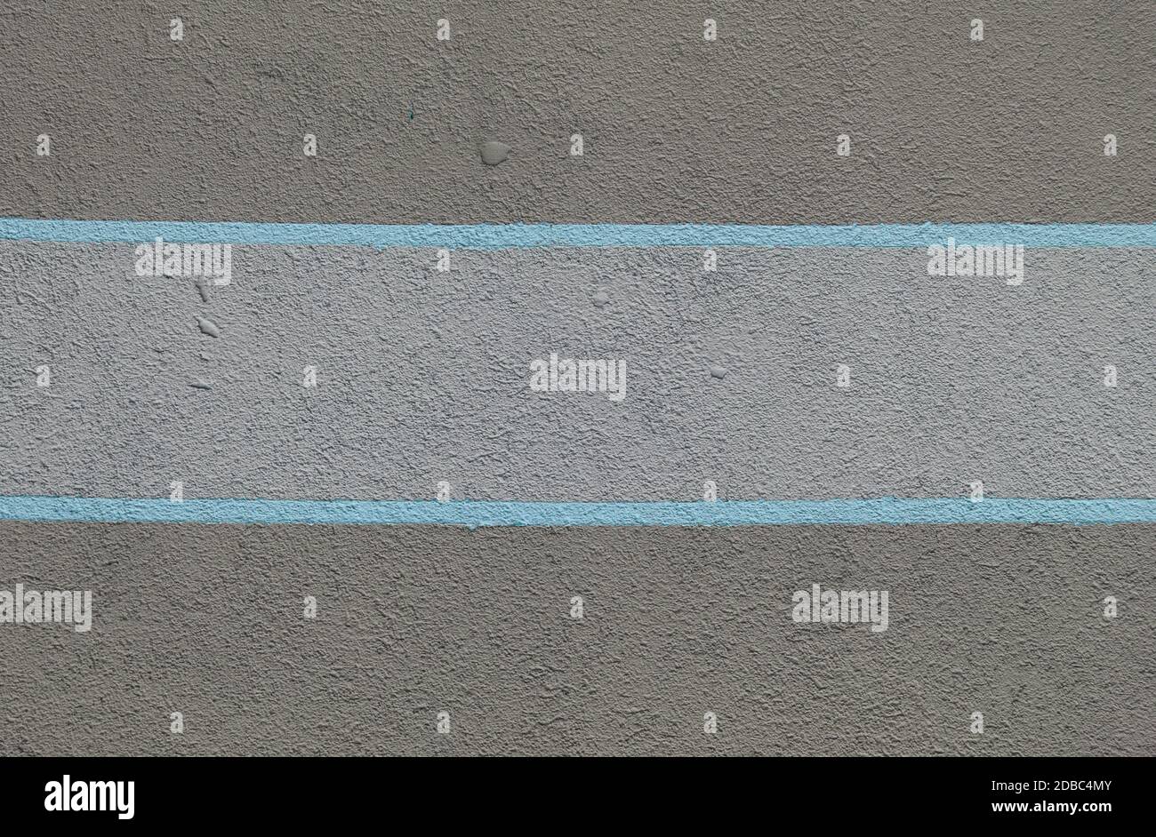 Blue stripes paint concrete wall surface. Painted cement structure ...