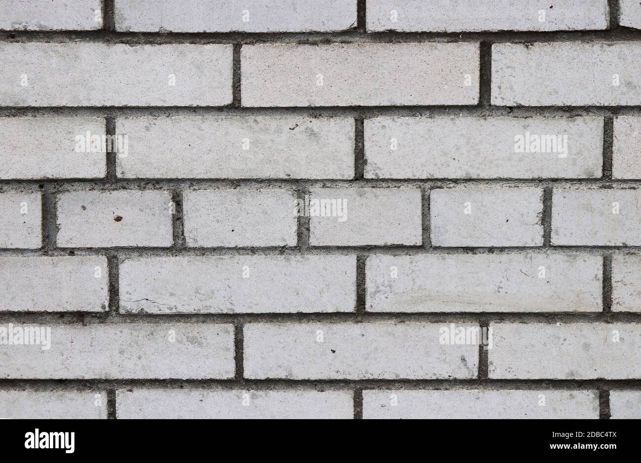 White bricks building facade texture Stock Photo - Alamy