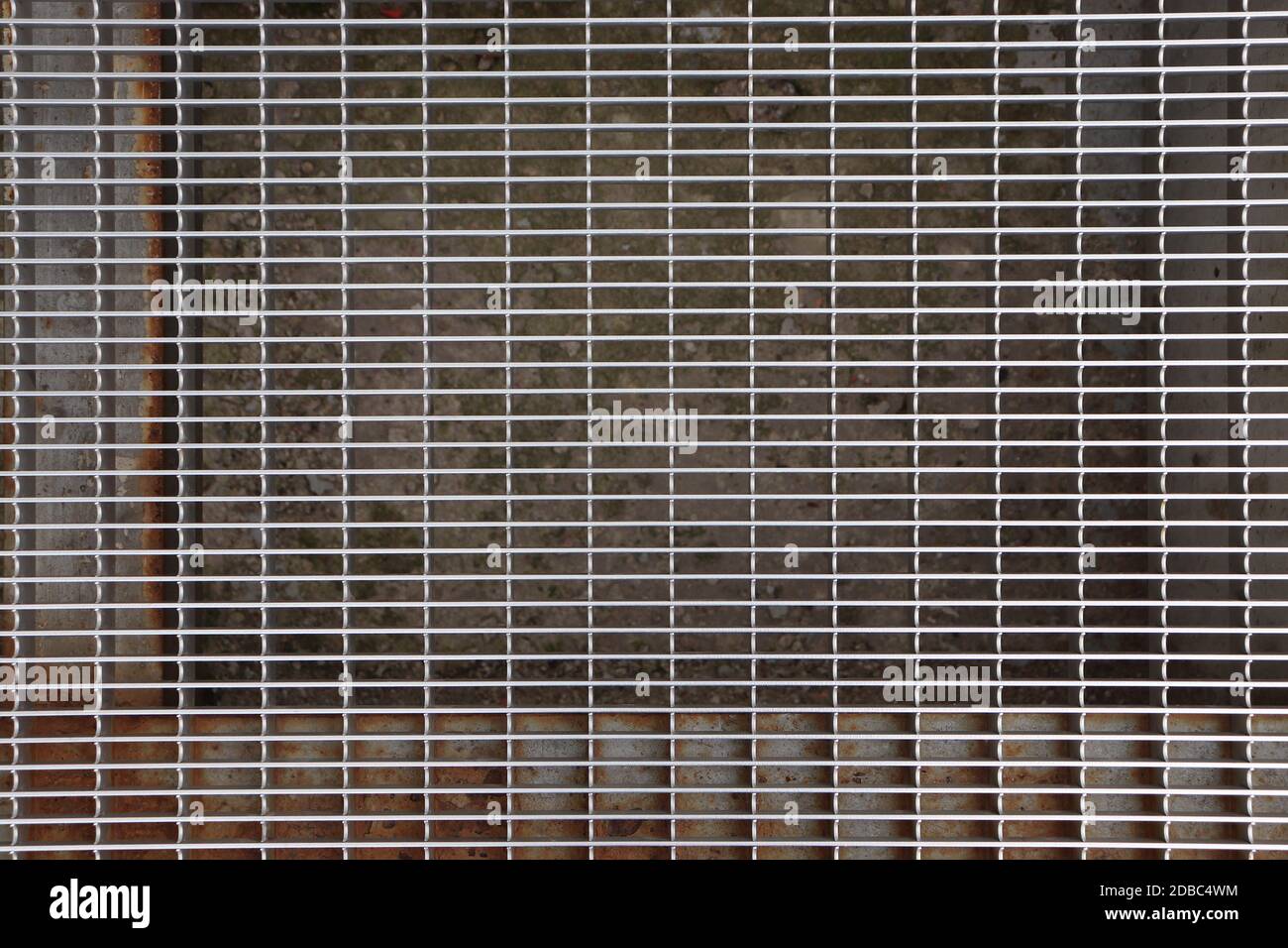 Metal gratings. Steel weathered doorstep cells Stock Photo - Alamy