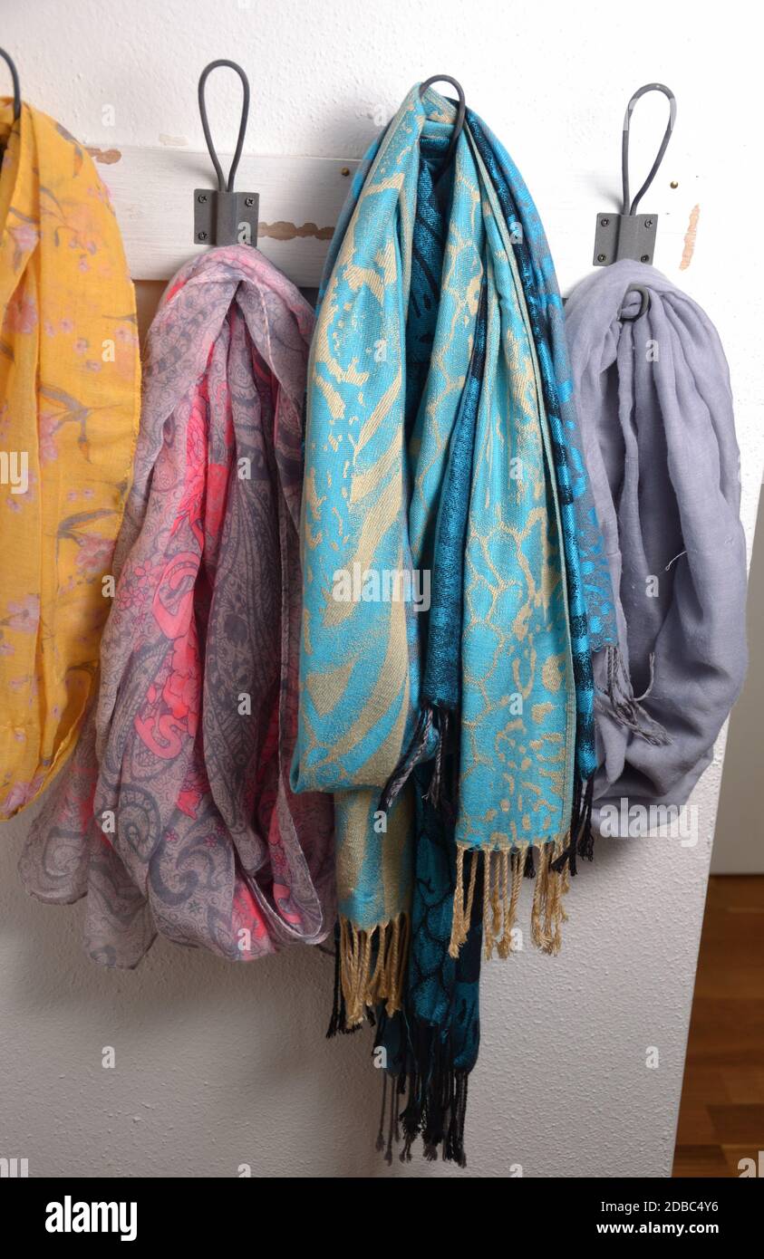 colorful scarves on a wardrobe Stock Photo - Alamy