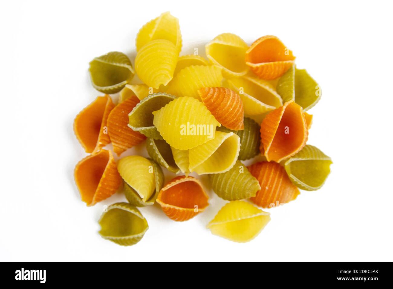 Colored conchiglie shell pasta isolated on white background Stock Photo ...