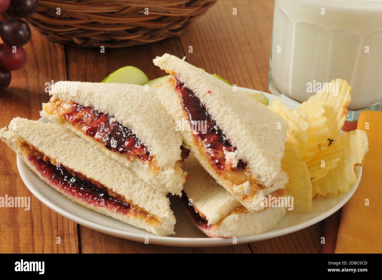 A peanut butter and jelly sandwich with the crust trimmed off Stock ...