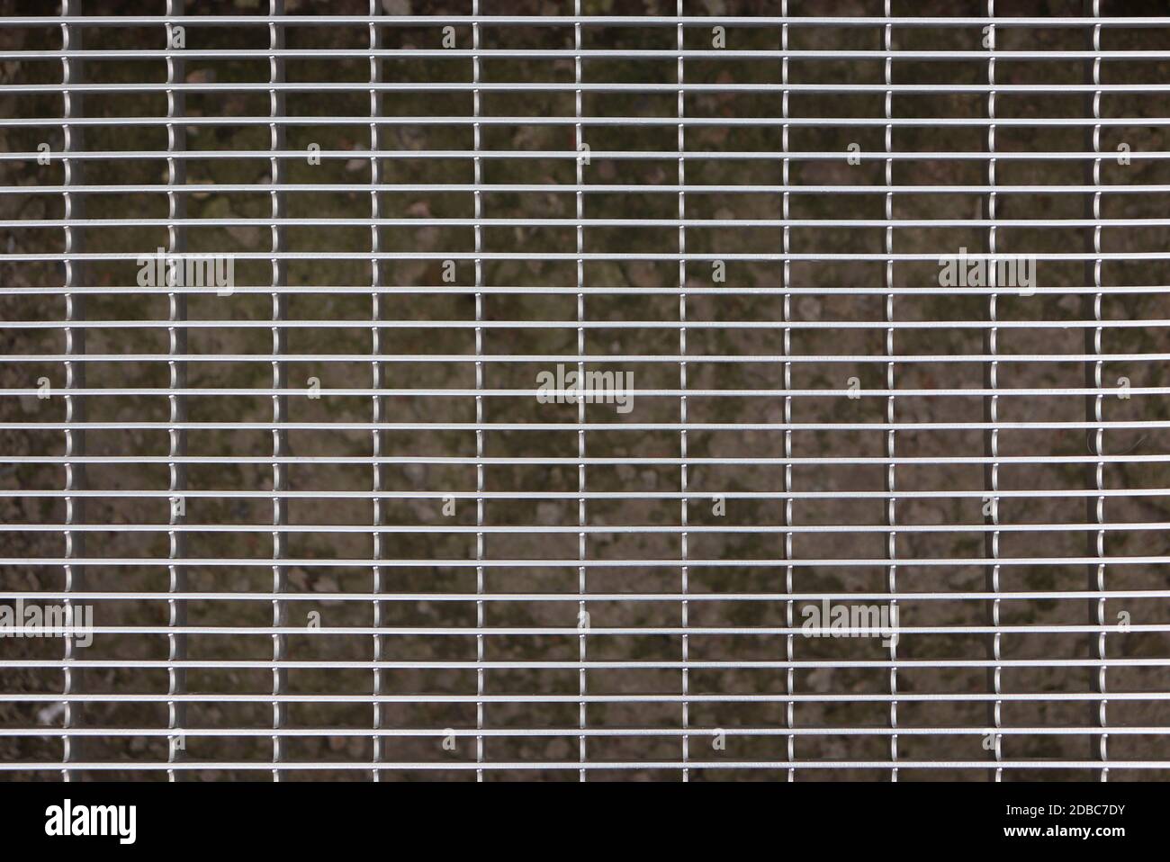 Metal gratings. Steel weathered doorstep cells Stock Photo - Alamy