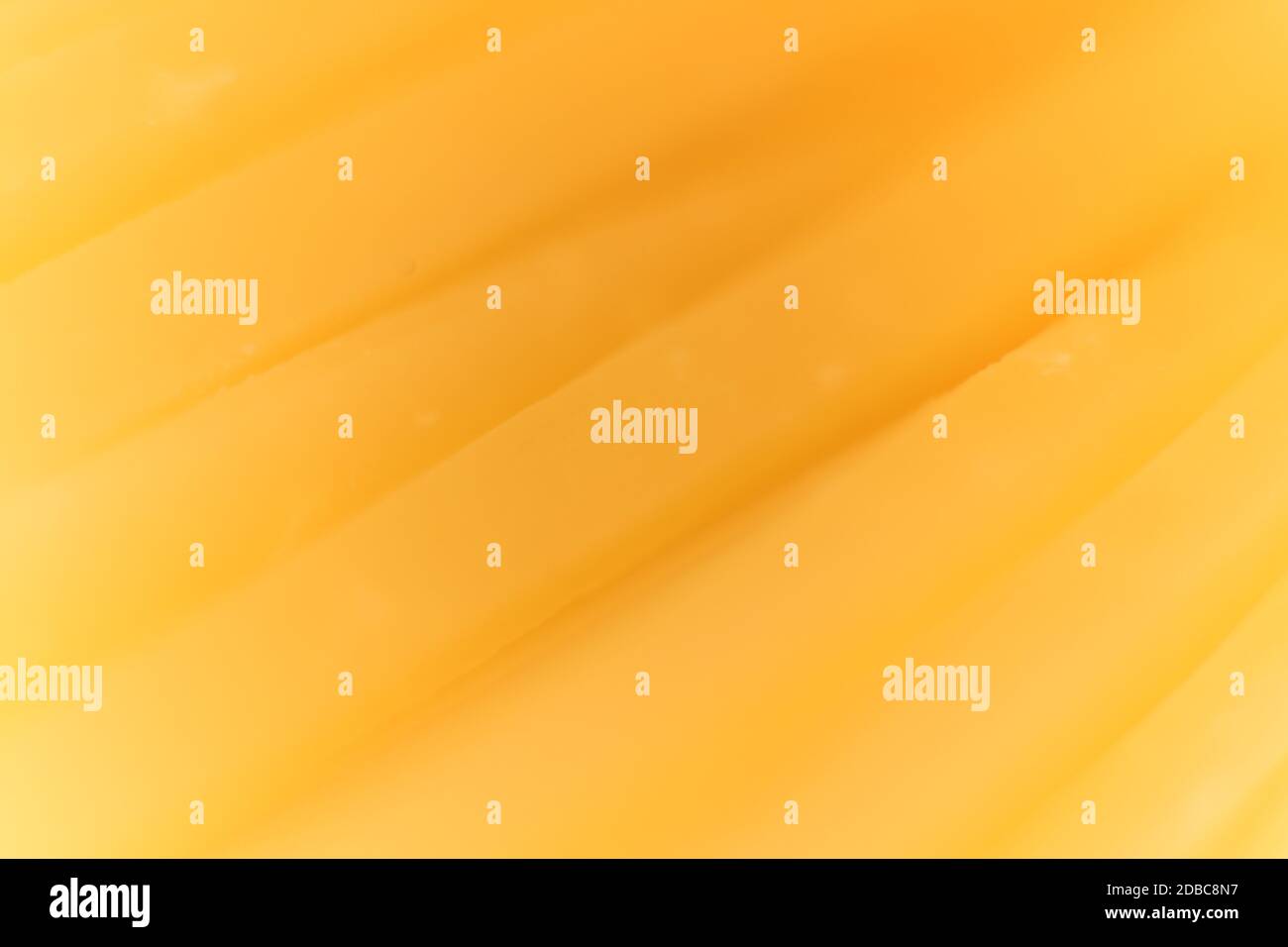 Solid cheese slices macro closeup. Background Texture Stock Photo - Alamy