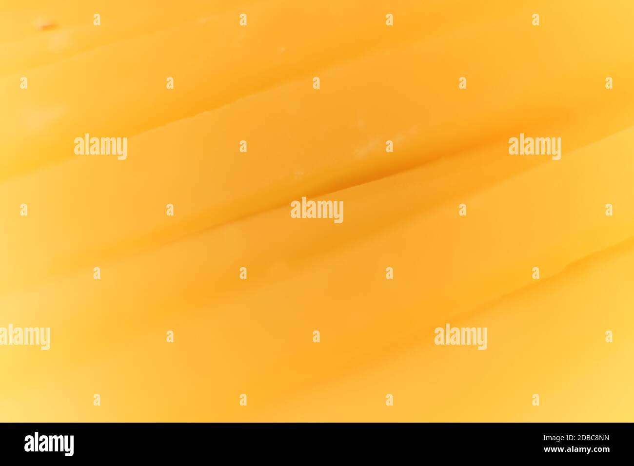 Solid cheese slices macro closeup. Background Texture Stock Photo - Alamy