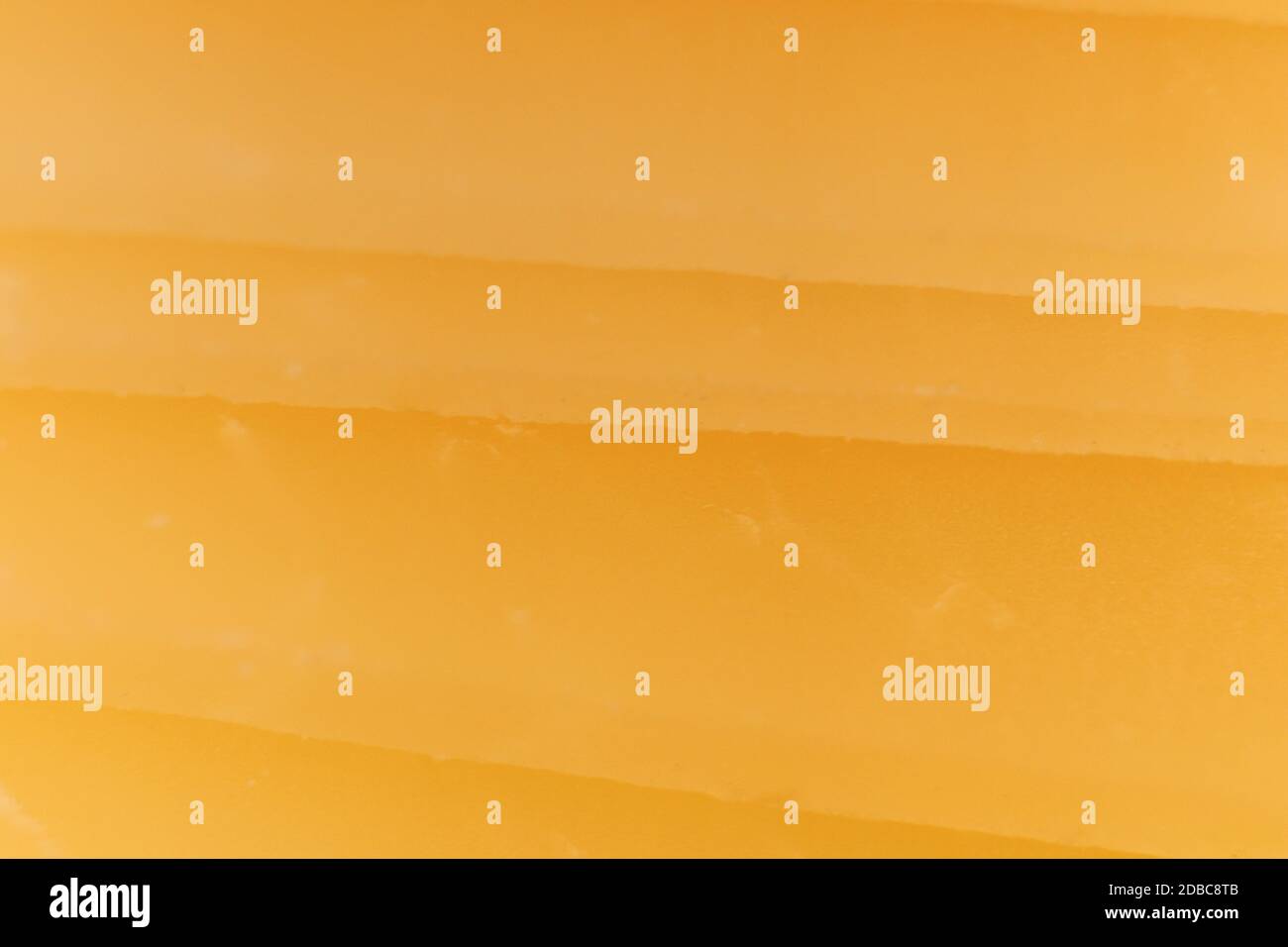 Solid cheese slices macro closeup. Background Texture Stock Photo - Alamy