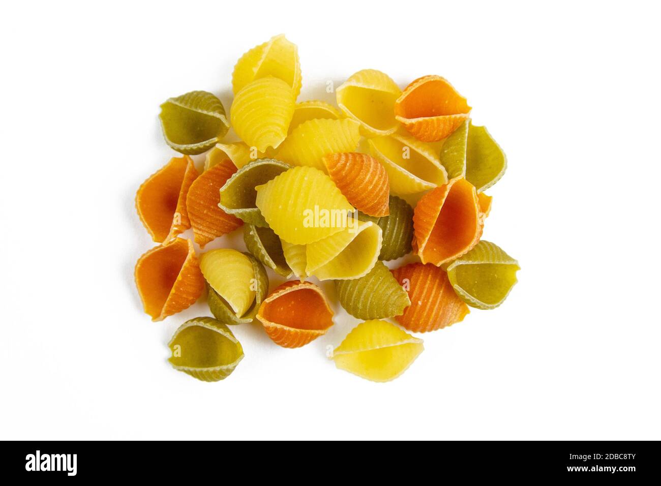 Colored conchiglie shell pasta isolated on white background Stock Photo ...