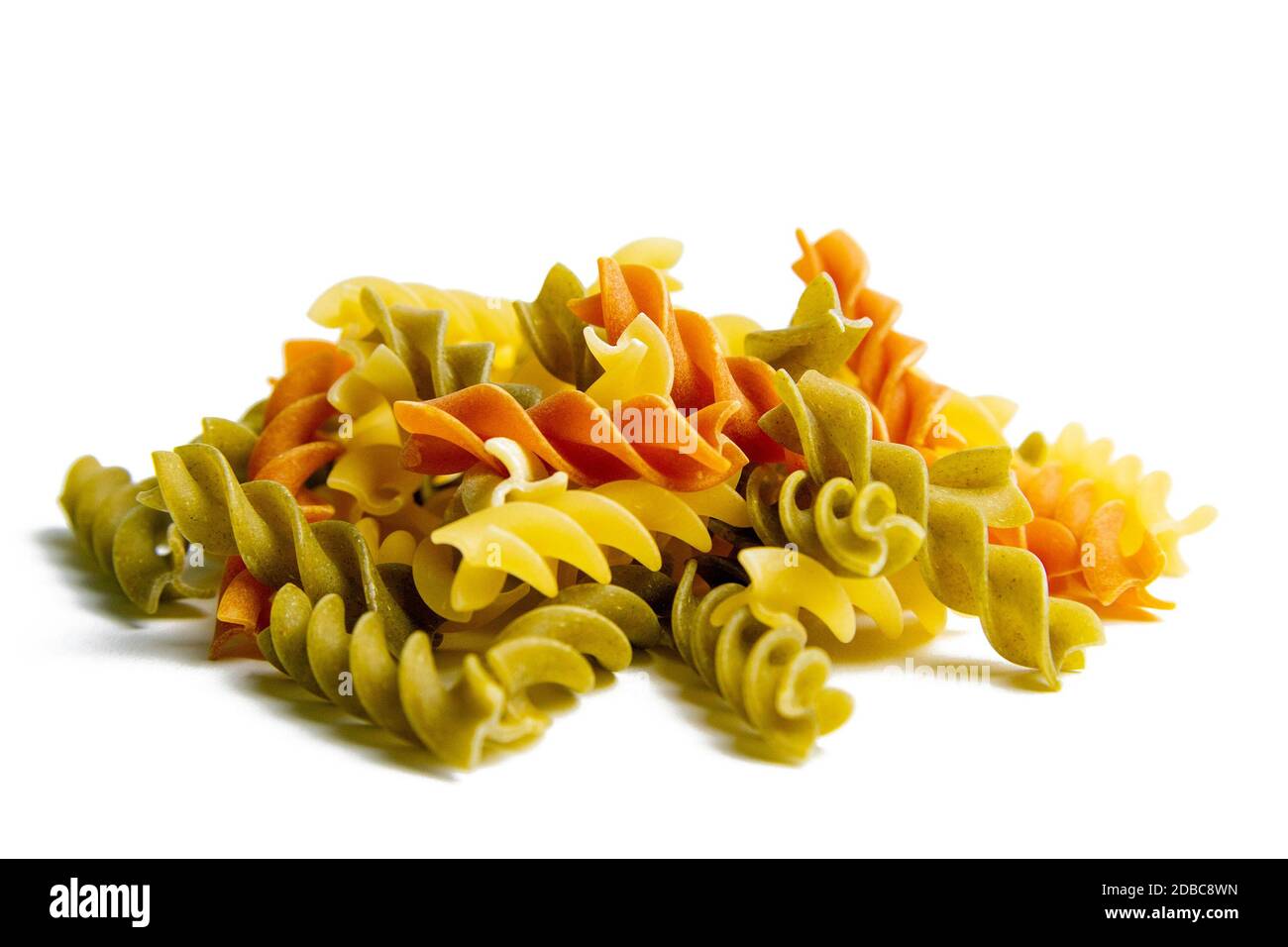 Italian pasta fusilli isolated on white background Stock Photo - Alamy
