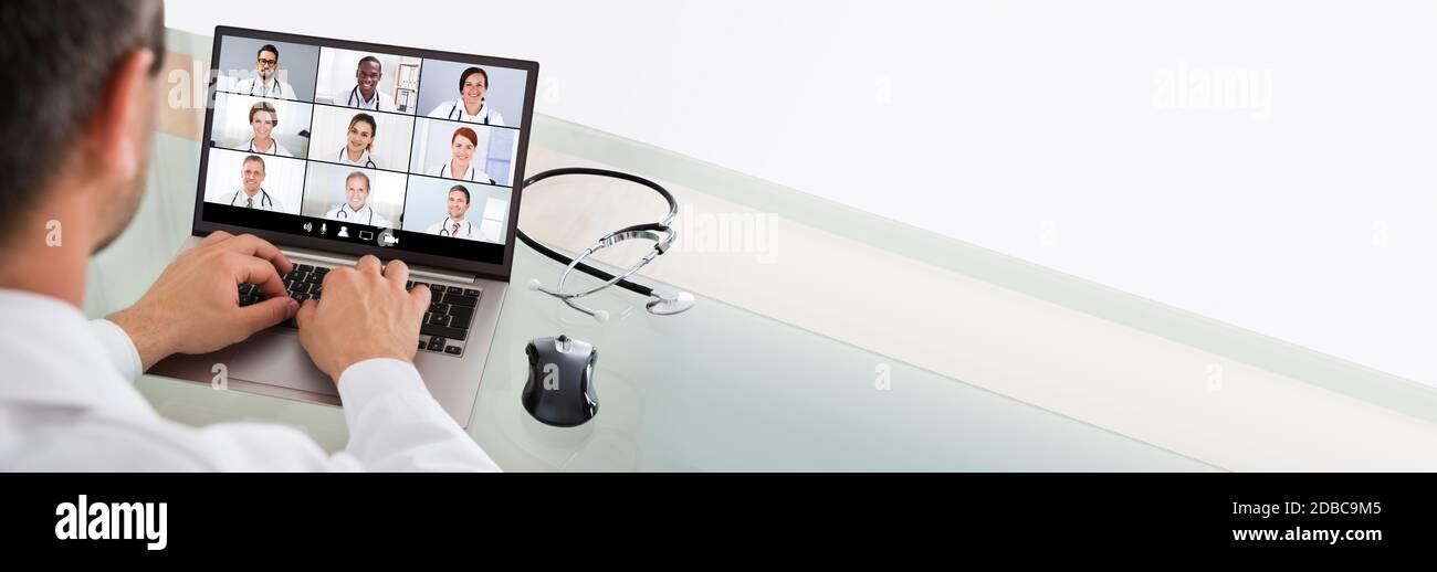 Doctors Video Conferencing And Learning Online On Computer Stock Photo ...