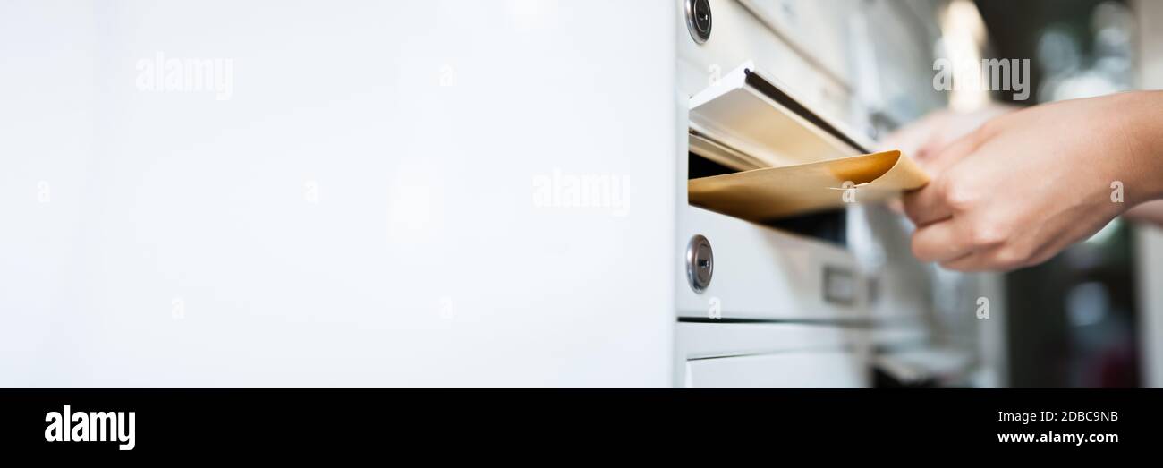 Postbox Envelope Mail Delivery. Inserting Letter In Mailbox Stock Photo ...