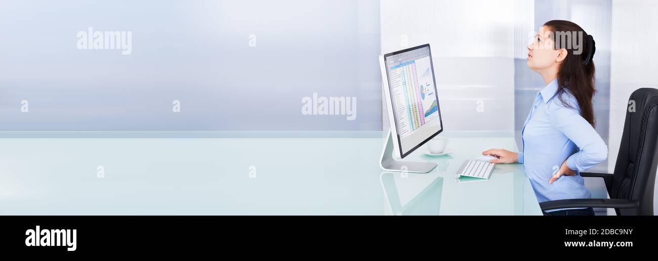 Bad Posture Back Pain And Stress Office Worker Stock Photo - Alamy