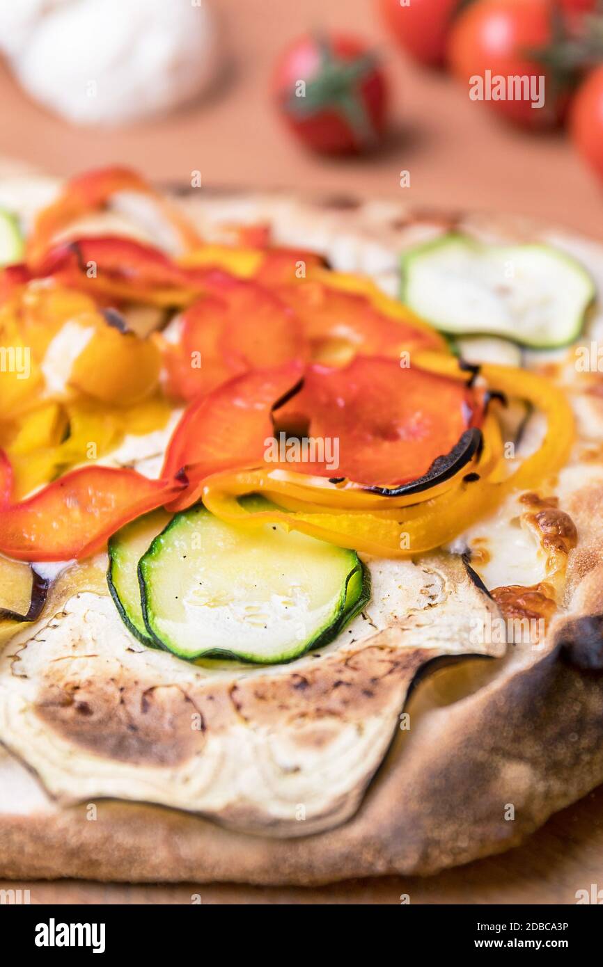 Fresh, veggie pizza with peppers, aubergines and grilled courgettes ...