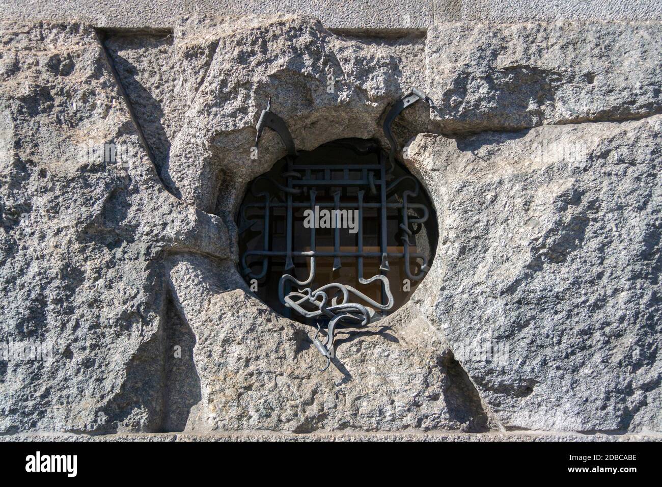 Ornately decorated round window in the ancient city of Milan, Italy ...