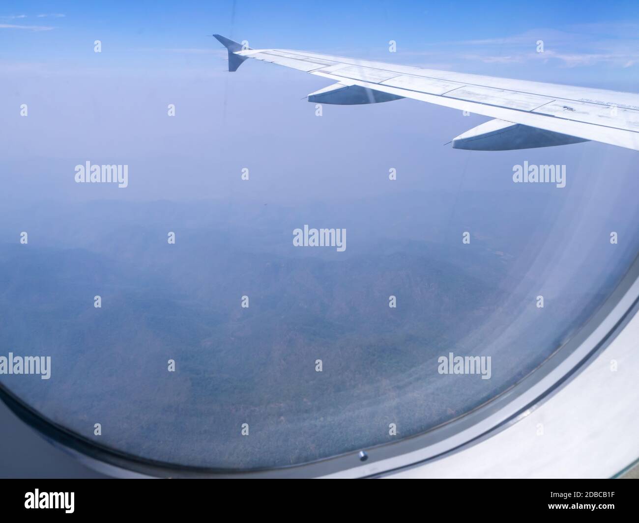 The looking at aircraft wing view from windows Stock Photo - Alamy