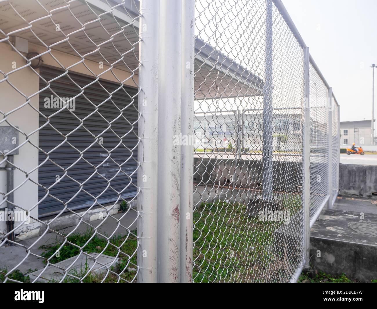 The Transformer station closed fence with barbed wire Stock Photo - Alamy