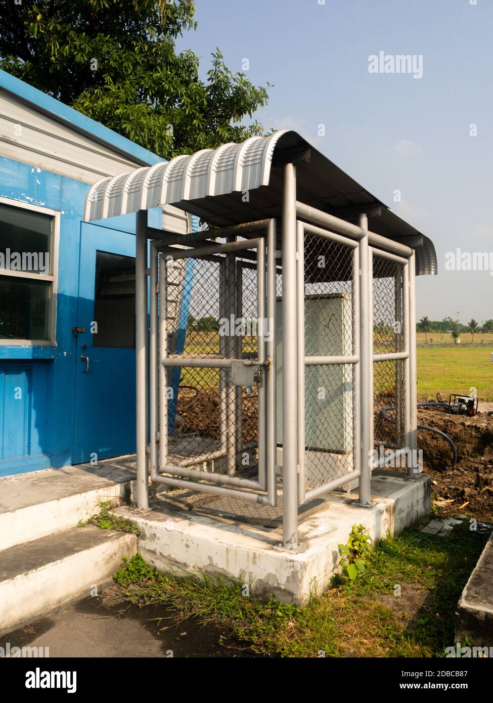 The Transformer station closed fence with barbed wire Stock Photo - Alamy