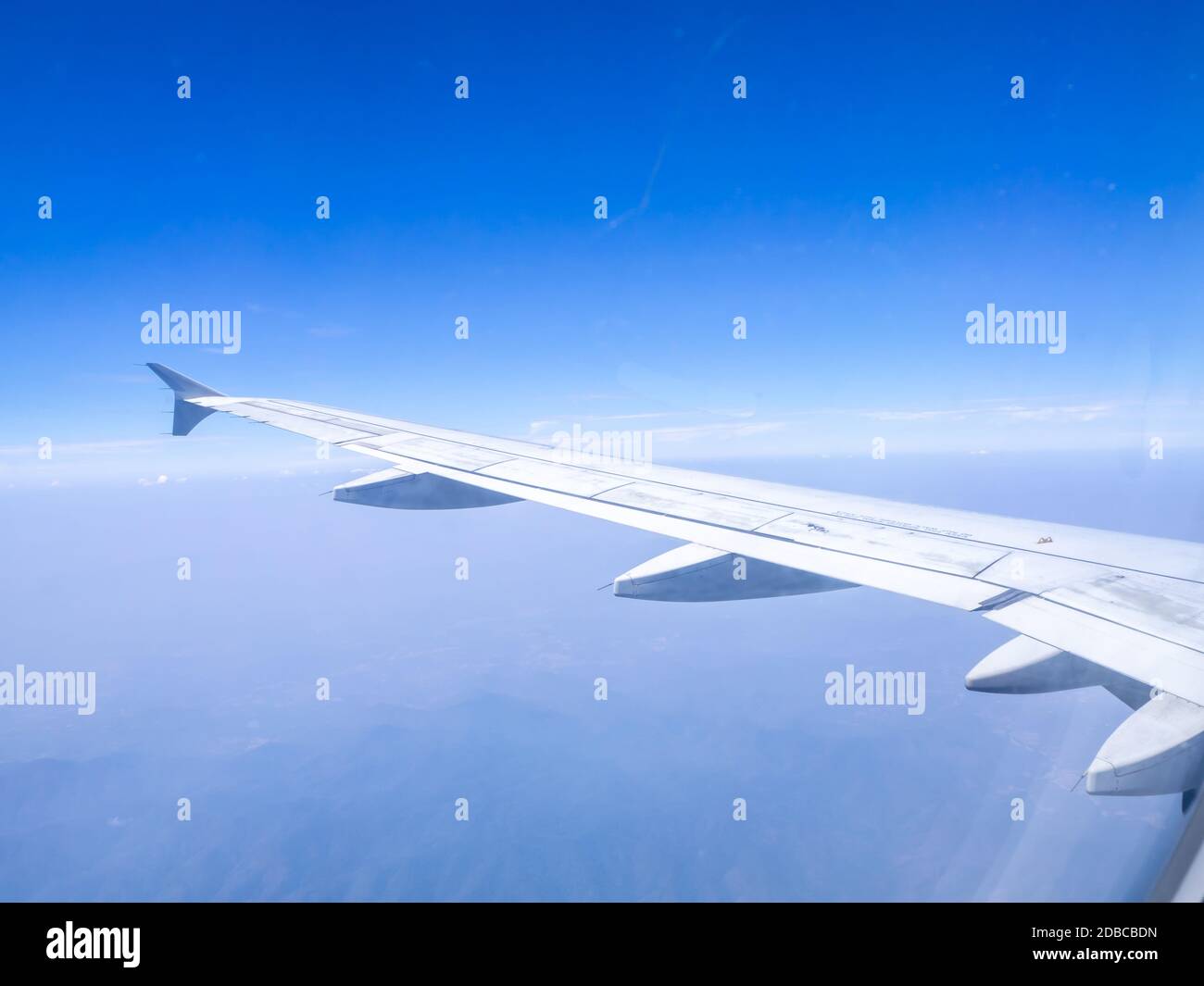 The looking at aircraft wing view from windows Stock Photo - Alamy