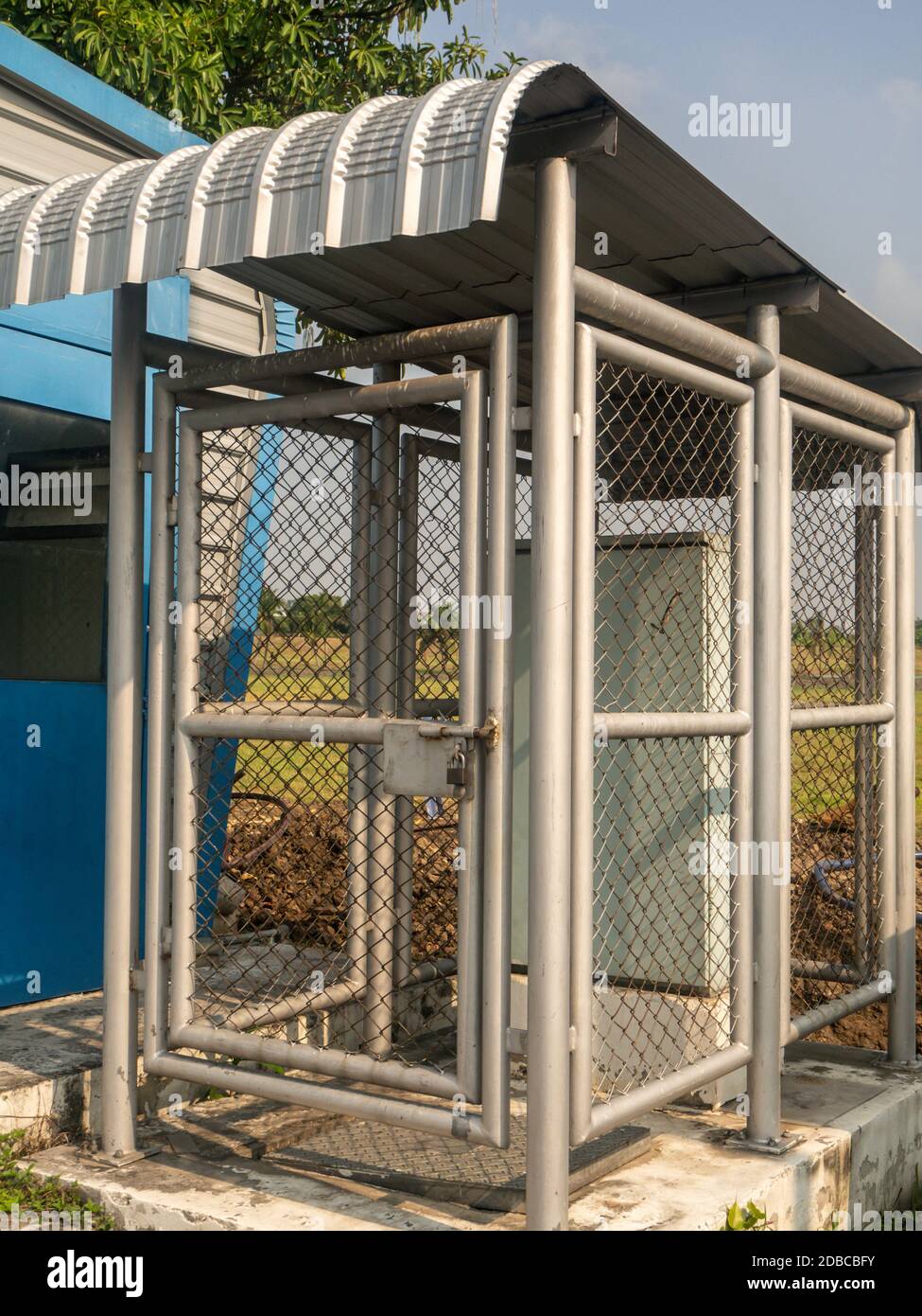 The Transformer station closed fence with barbed wire Stock Photo - Alamy