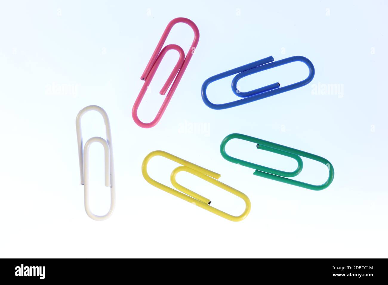 Five Colored Isolated Paper Clips. Office Stationery Equipment ...