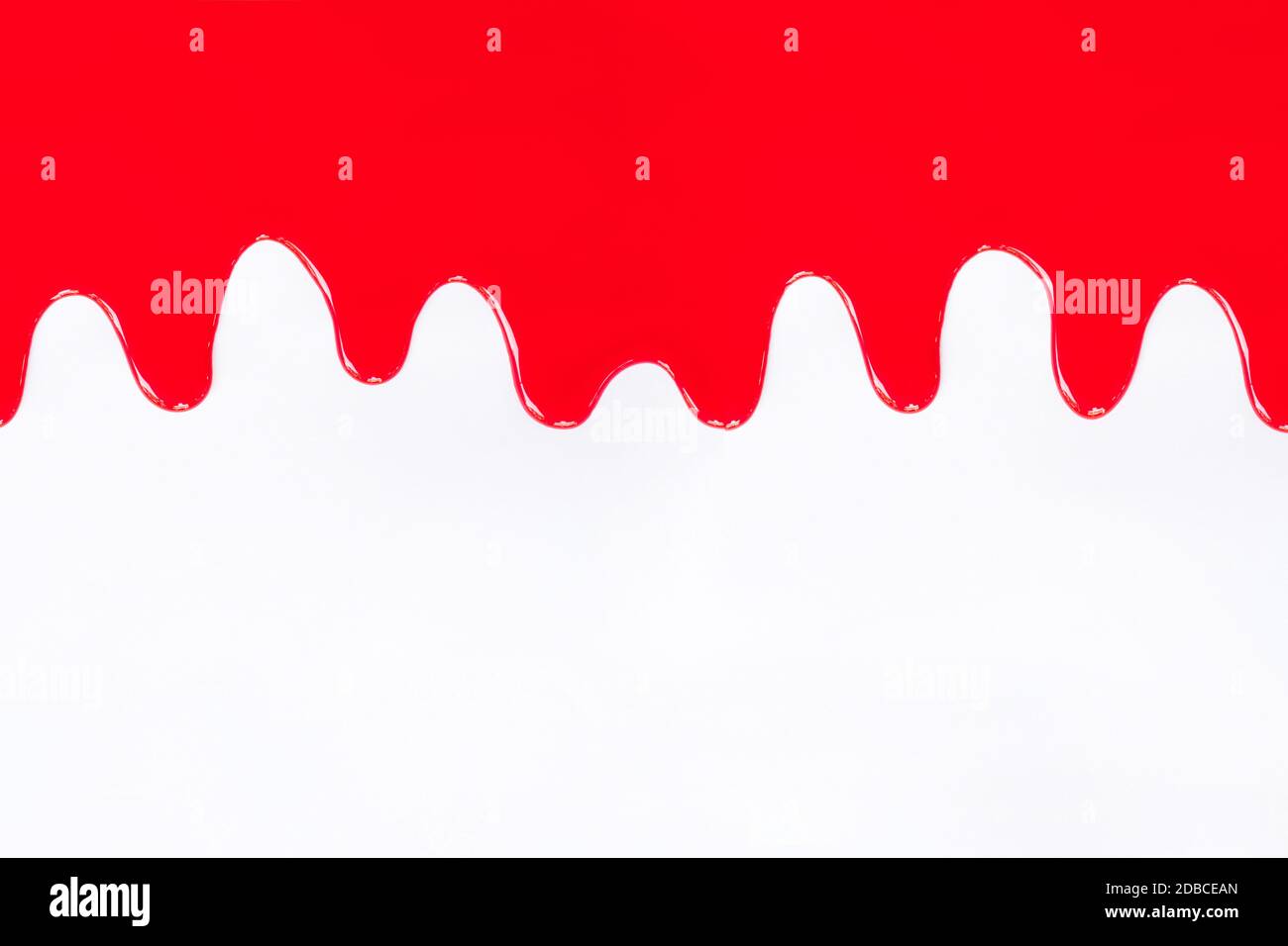 Red paint dripping on a white background Stock Photo - Alamy