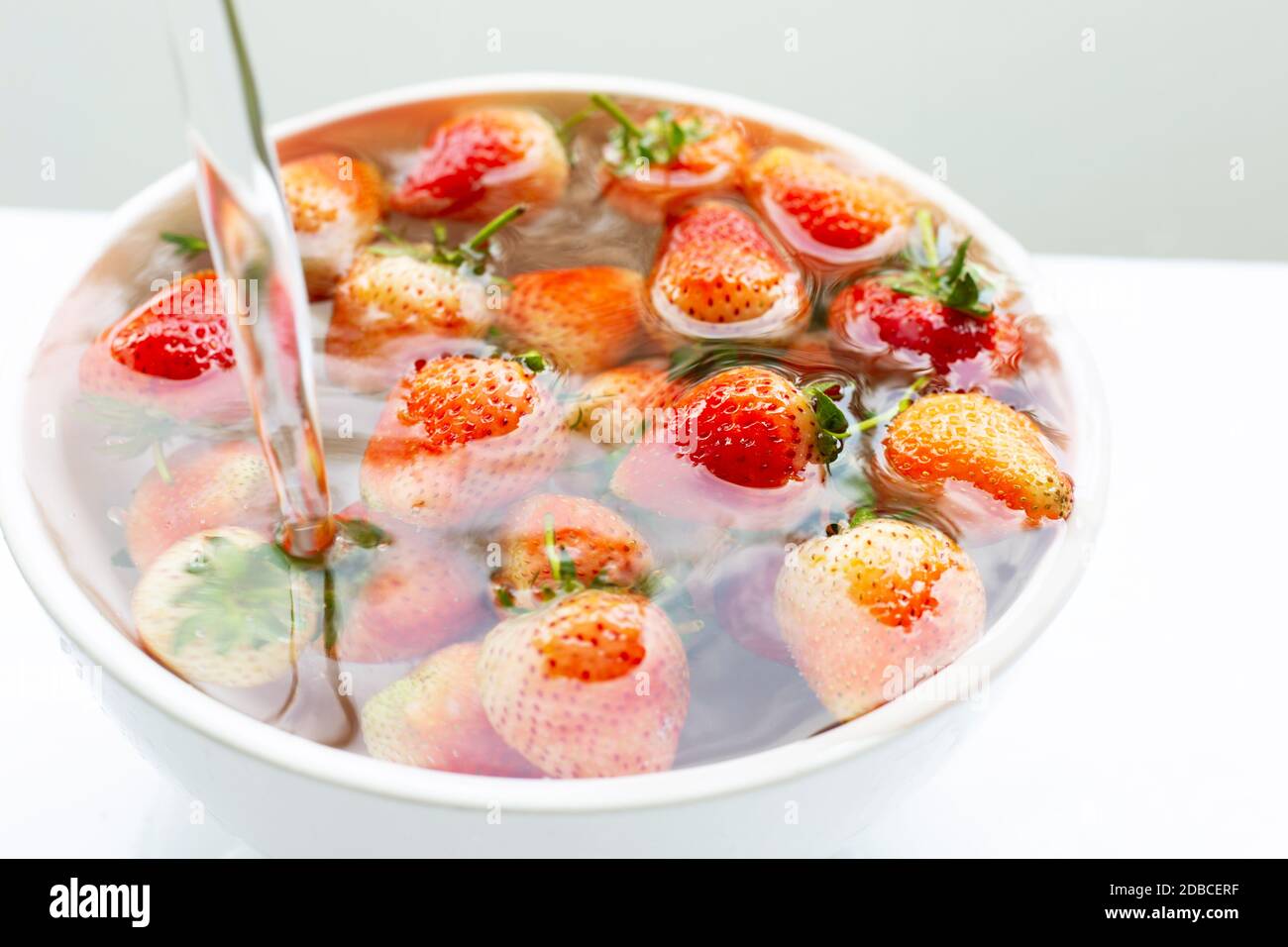 Washing fresh fruit hi-res stock photography and images - Alamy
