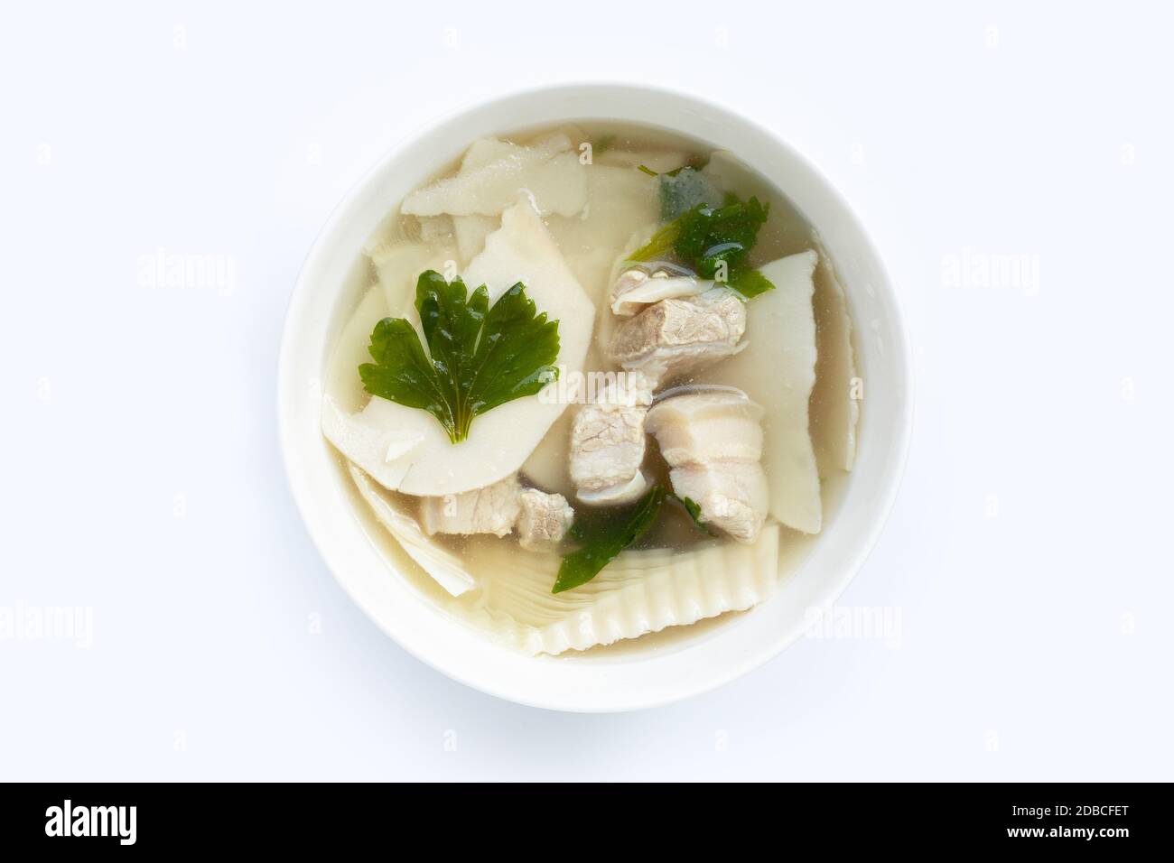 Bamboo shoots with pork soup on white background Stock Photo - Alamy