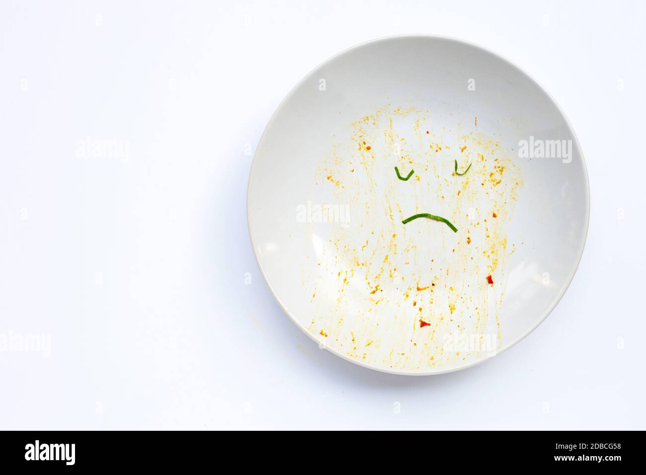 Dirty dish unhappy face on white background. Top view, Copy space Stock ...