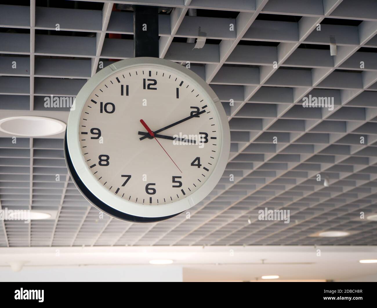 train station clock hanging from the ceiling Stock Photo - Alamy