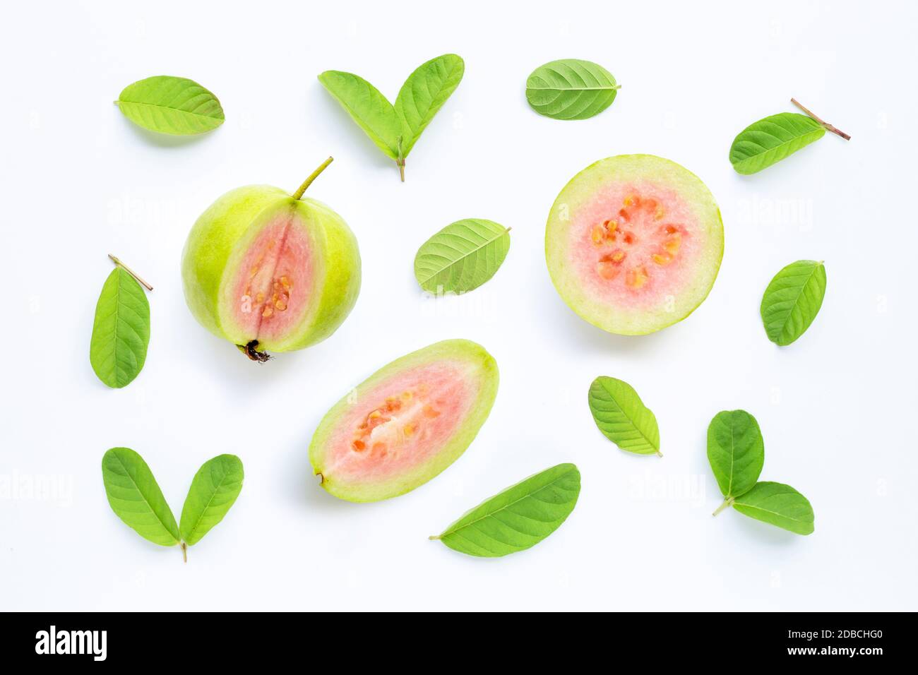 Guava with leaves on white background Stock Photo - Alamy