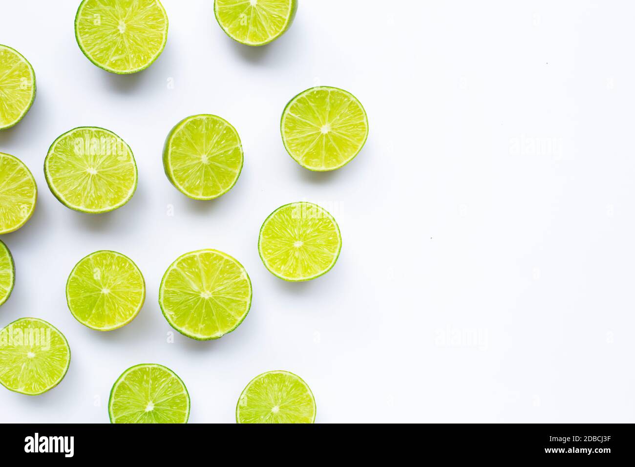 Limes isolated on white background. Copy space Stock Photo - Alamy
